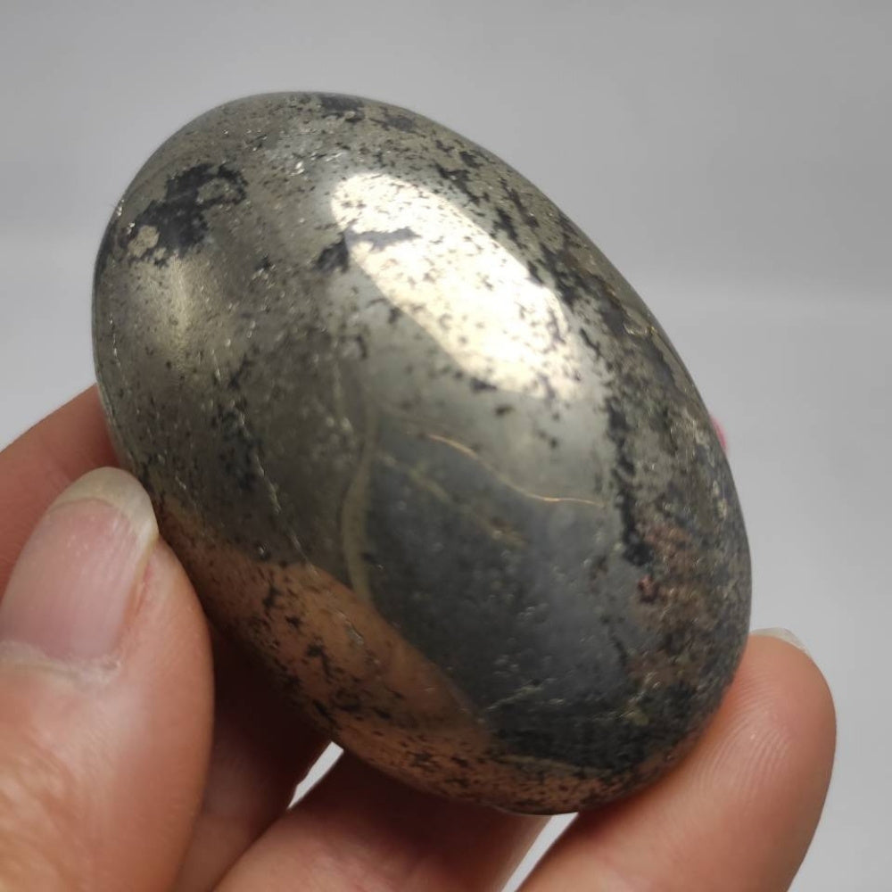 Polished Pyrite Palm Stone – MindfulSouls
